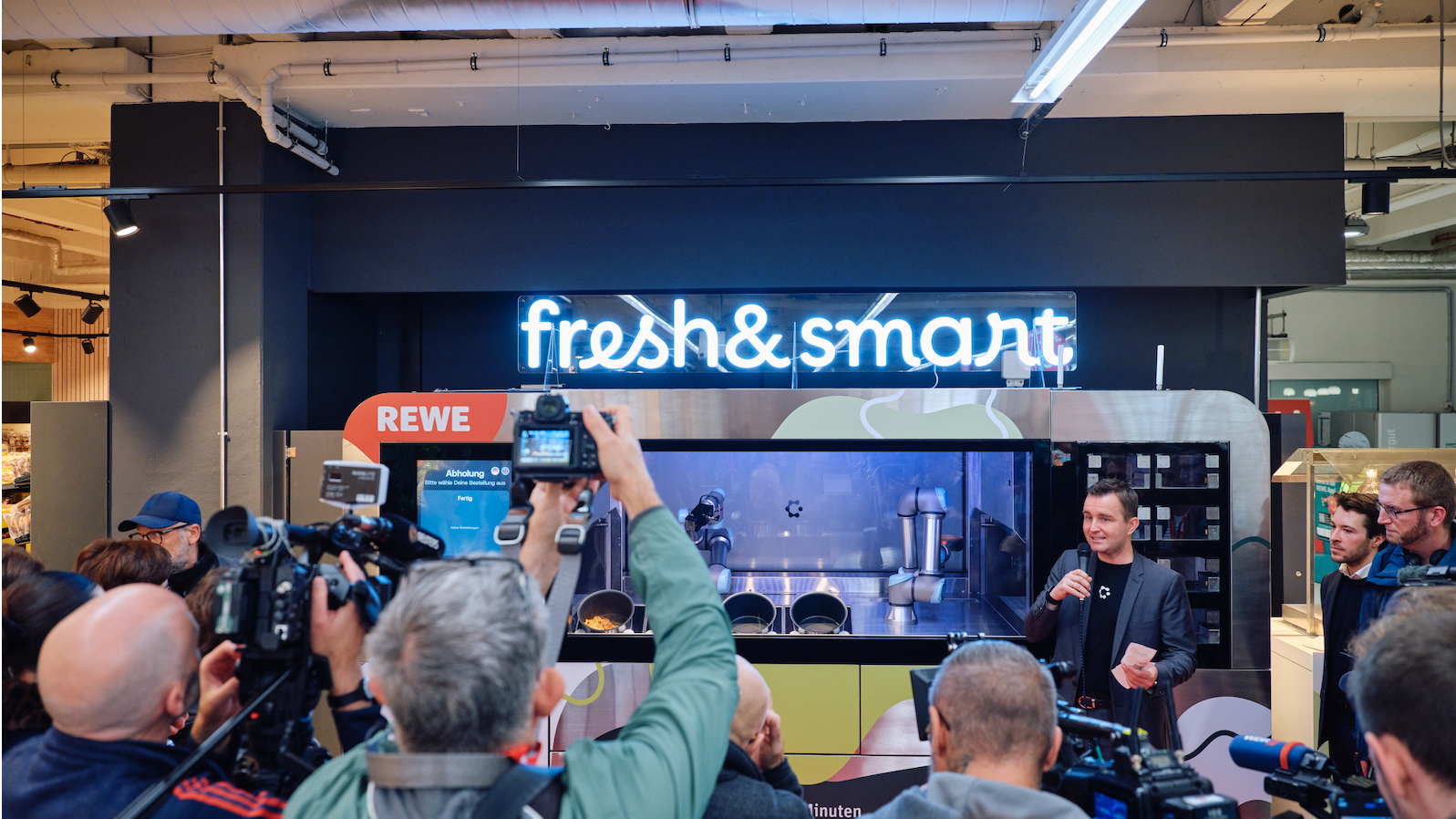 REWE West installs AI-powered autonomous cooking robot in Düsseldorf ...